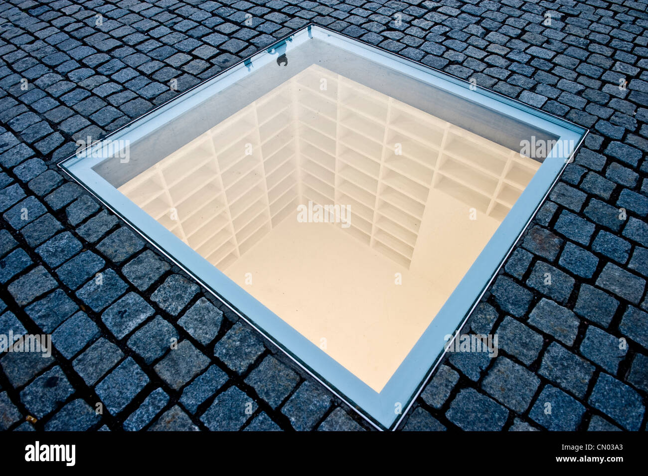A neat window going into the ground in a German street Stock Photo - Alamy