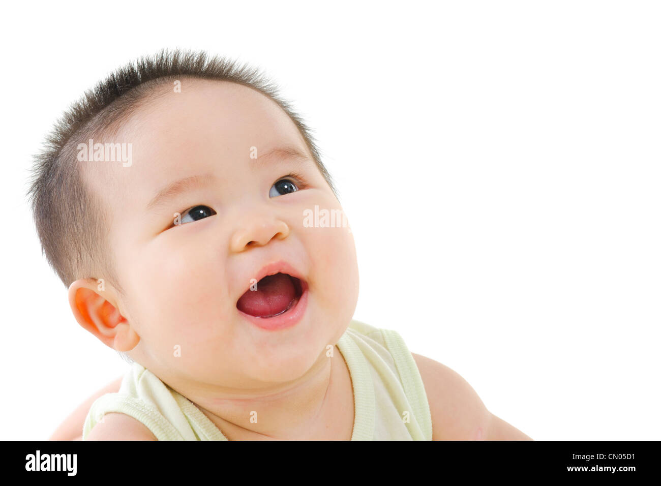 Happy pan Asian baby looking up and smiling Stock Photo - Alamy