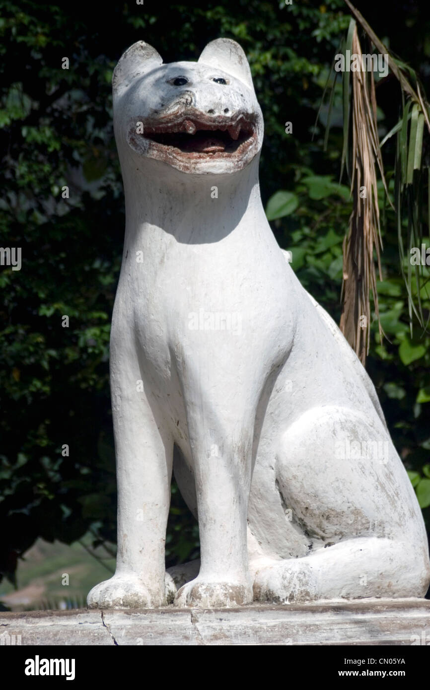 A bright lion statue decorates a beautiful Buddhist temple in Luang ...