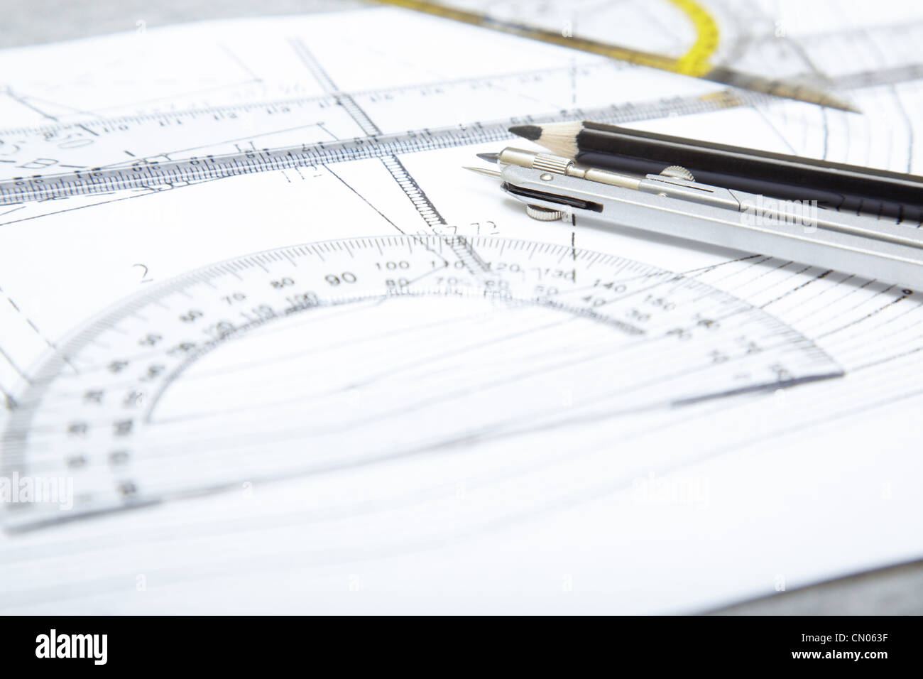 Scheme with compasses rulers and pencil. Close-up photo Stock Photo - Alamy