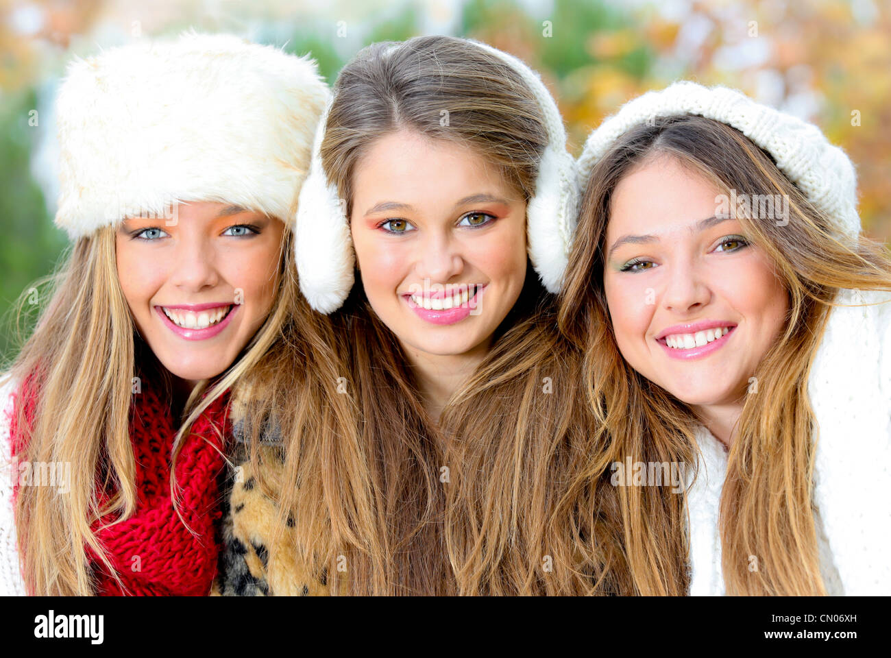 group of winter girls or young women with perfect white teeth Stock ...