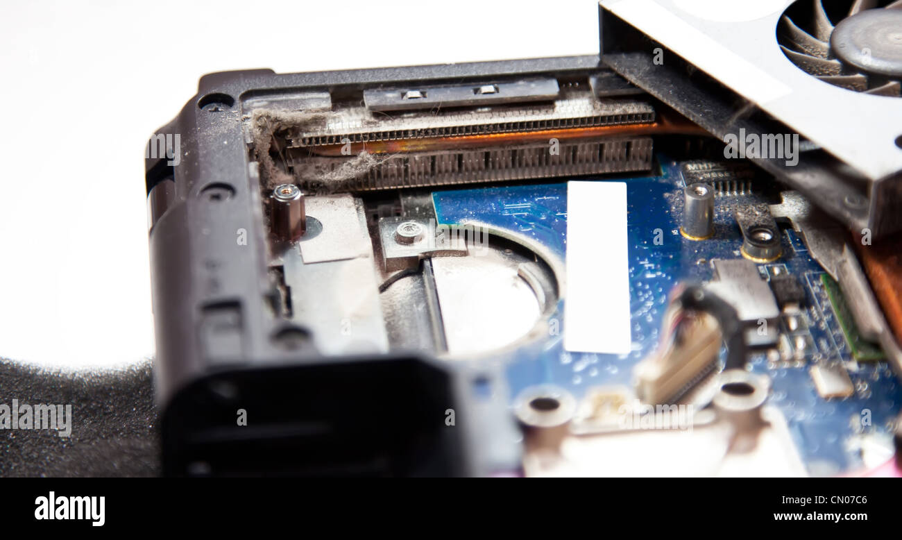 Laptop inside dirty cooling system full of dust Stock Photo - Alamy