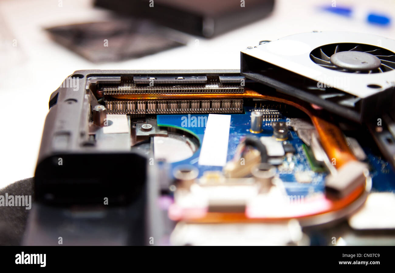 Laptop case opebed and cleaned from dust inside Stock Photo - Alamy