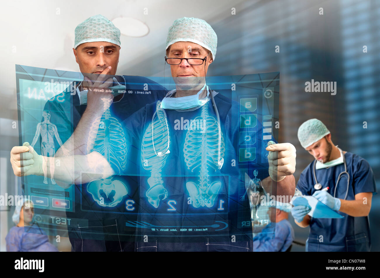 Doctors looking at screens hi-res stock photography and images - Alamy