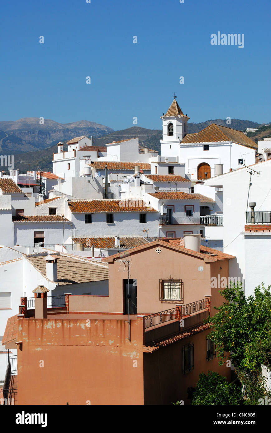 View of the town and church with mountains to the rear, Sayalonga ...