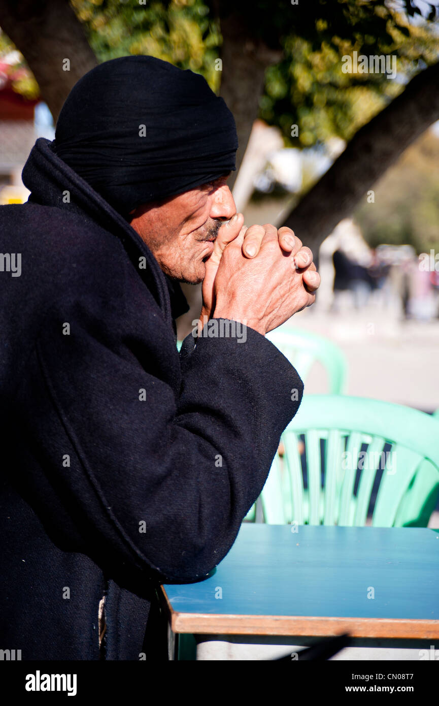 An old Arabic man who thinks, Feriana Tunisia Stock Photo - Alamy