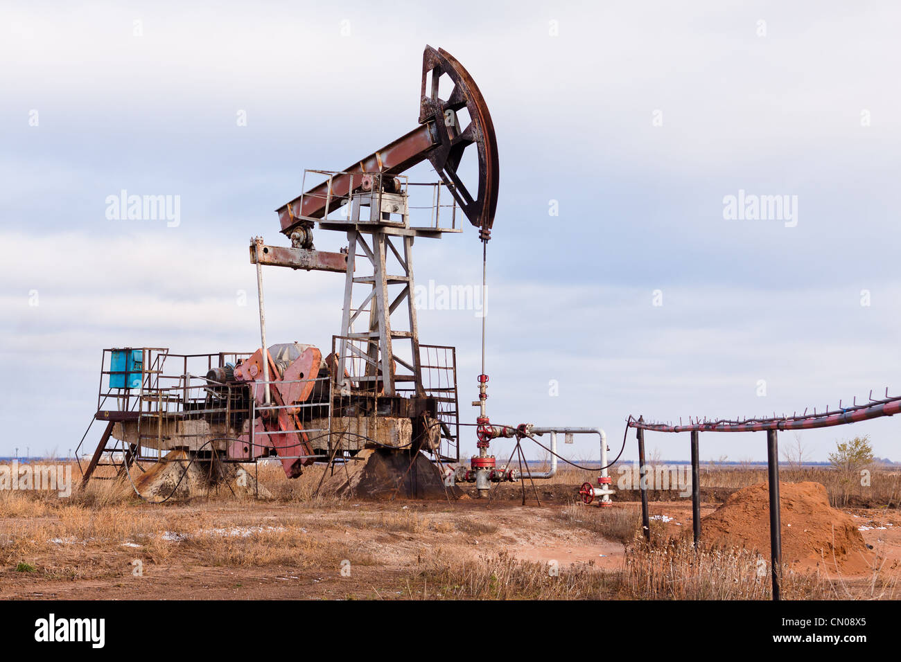 Rusty and worn oil pump and pipe Stock Photo - Alamy