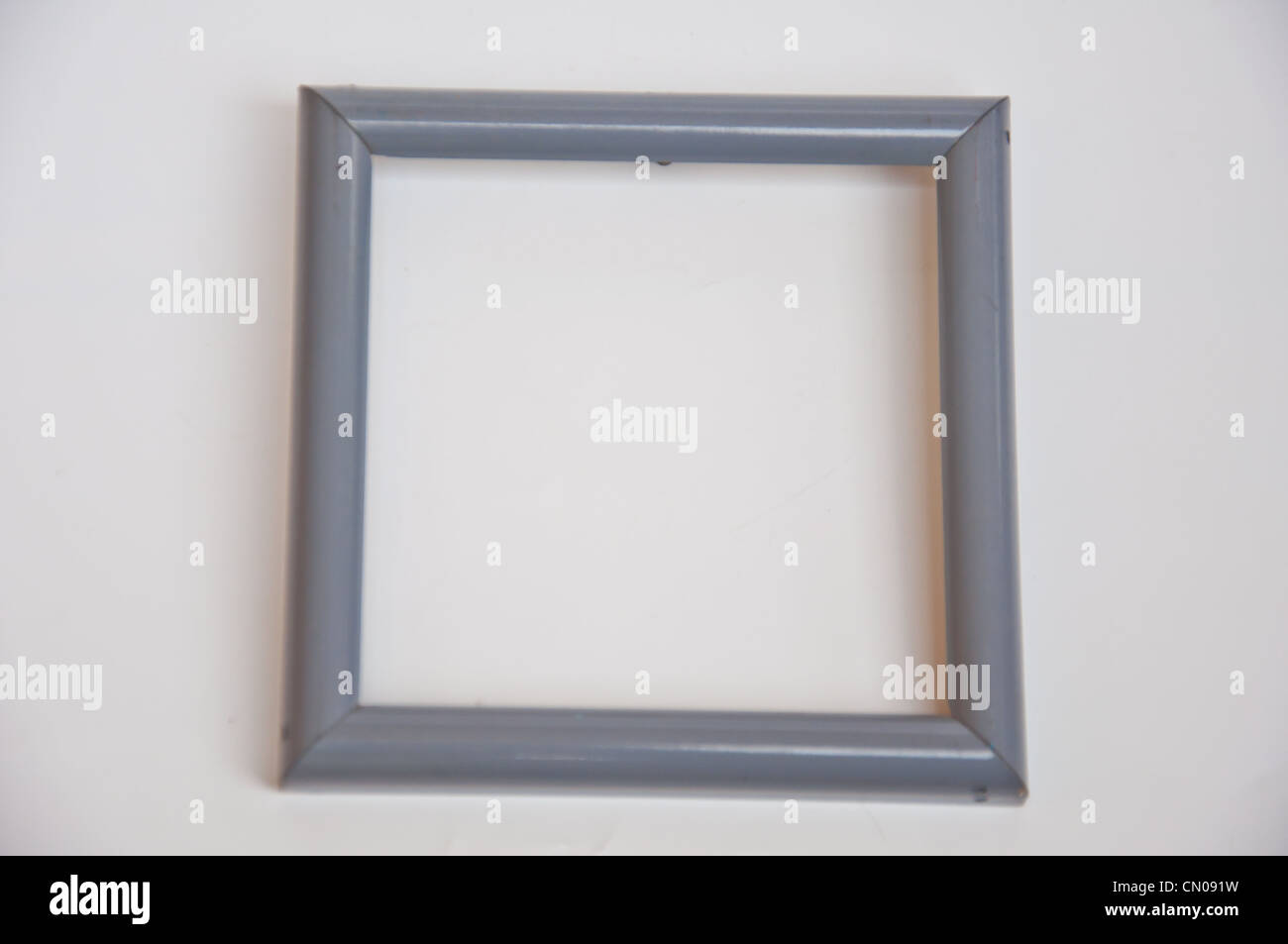 Blue blank frame on white background Stock Photo - Alamy