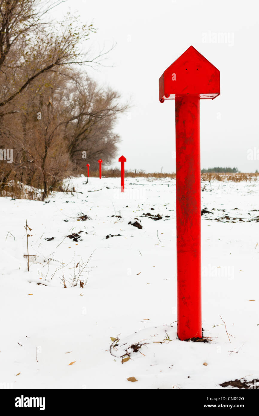 The red markers on the pipeline Stock Photo - Alamy