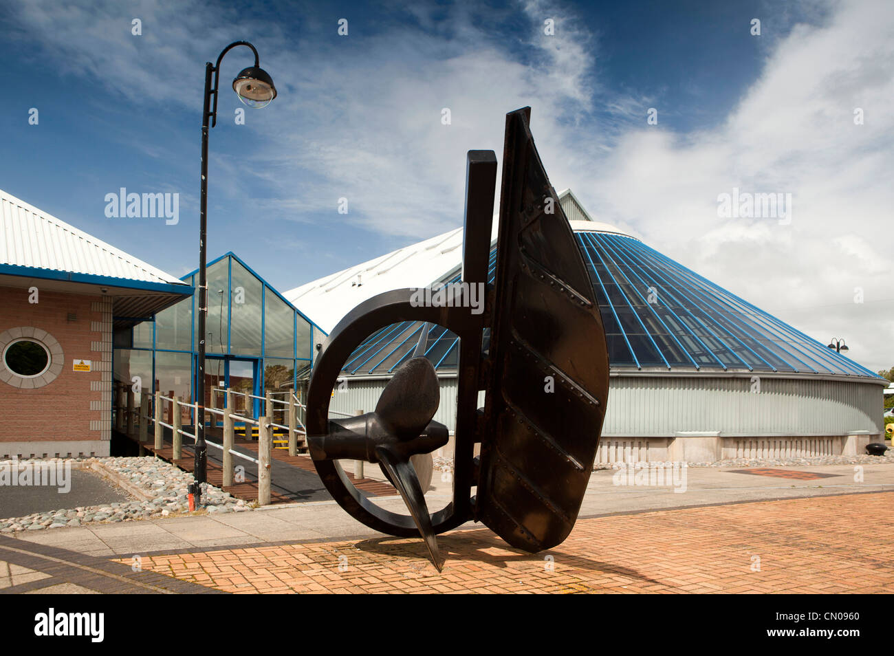 UK, Cumbria, Barrow in Furness, ship’s propellor and rudder at entrance ...