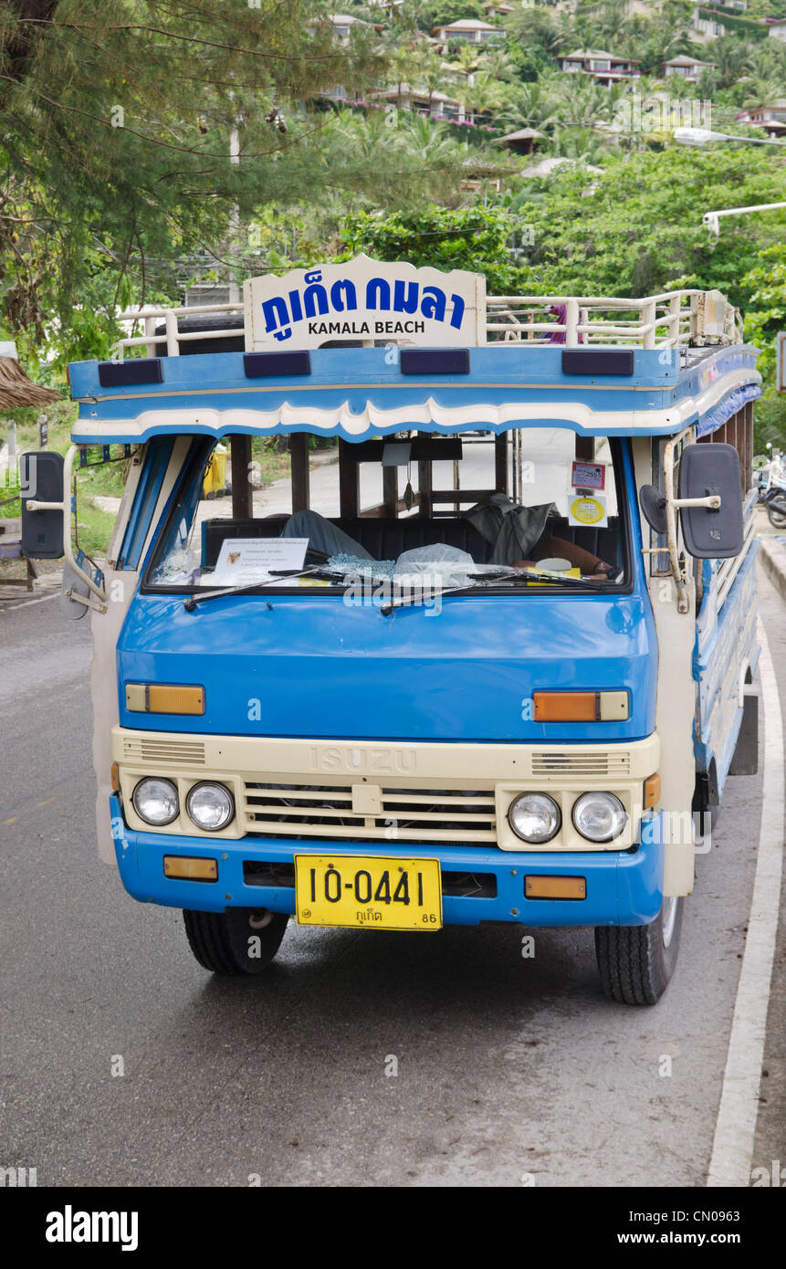A sleeping driver inside a Kamala Beach local bus known as a songthaew ...