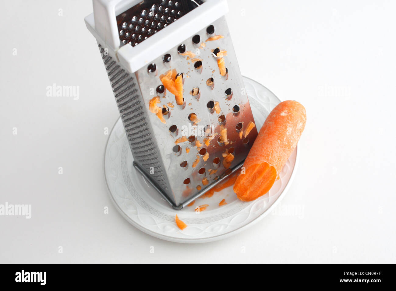 Grated carrot hi-res stock photography and images - Alamy