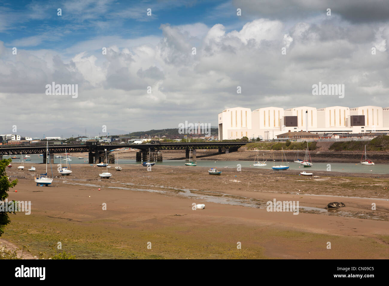 UK, Cumbria, Barrow in Furness, boats moored in Walney Channel at low ...