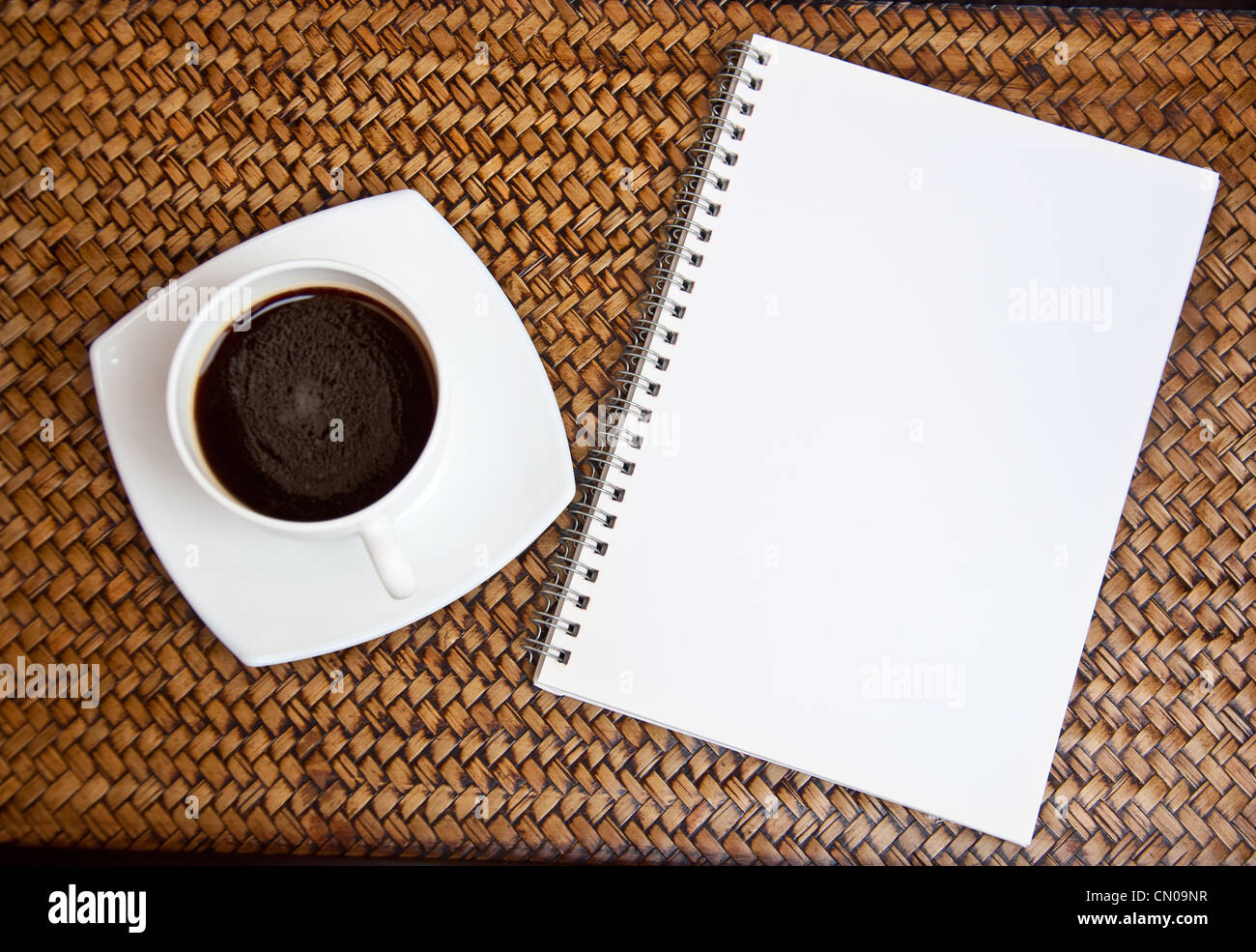 blank paper and black coffee on sedge background Stock Photo - Alamy