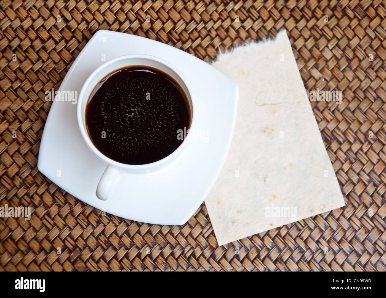 Blank paper and black coffee on sedge background Stock Photo - Alamy