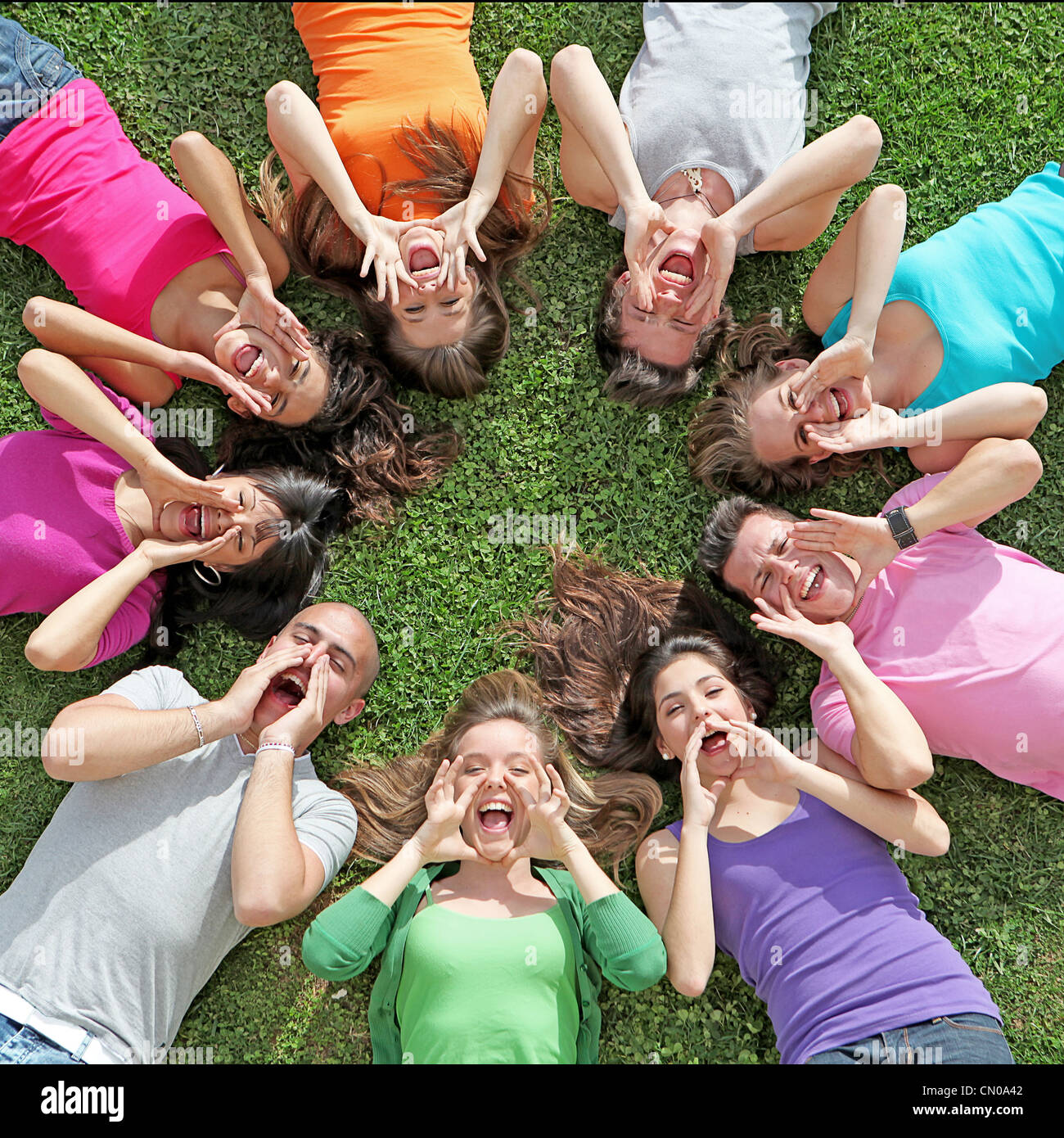 group of kids or teens shouting or singing at summer camp Stock Photo ...