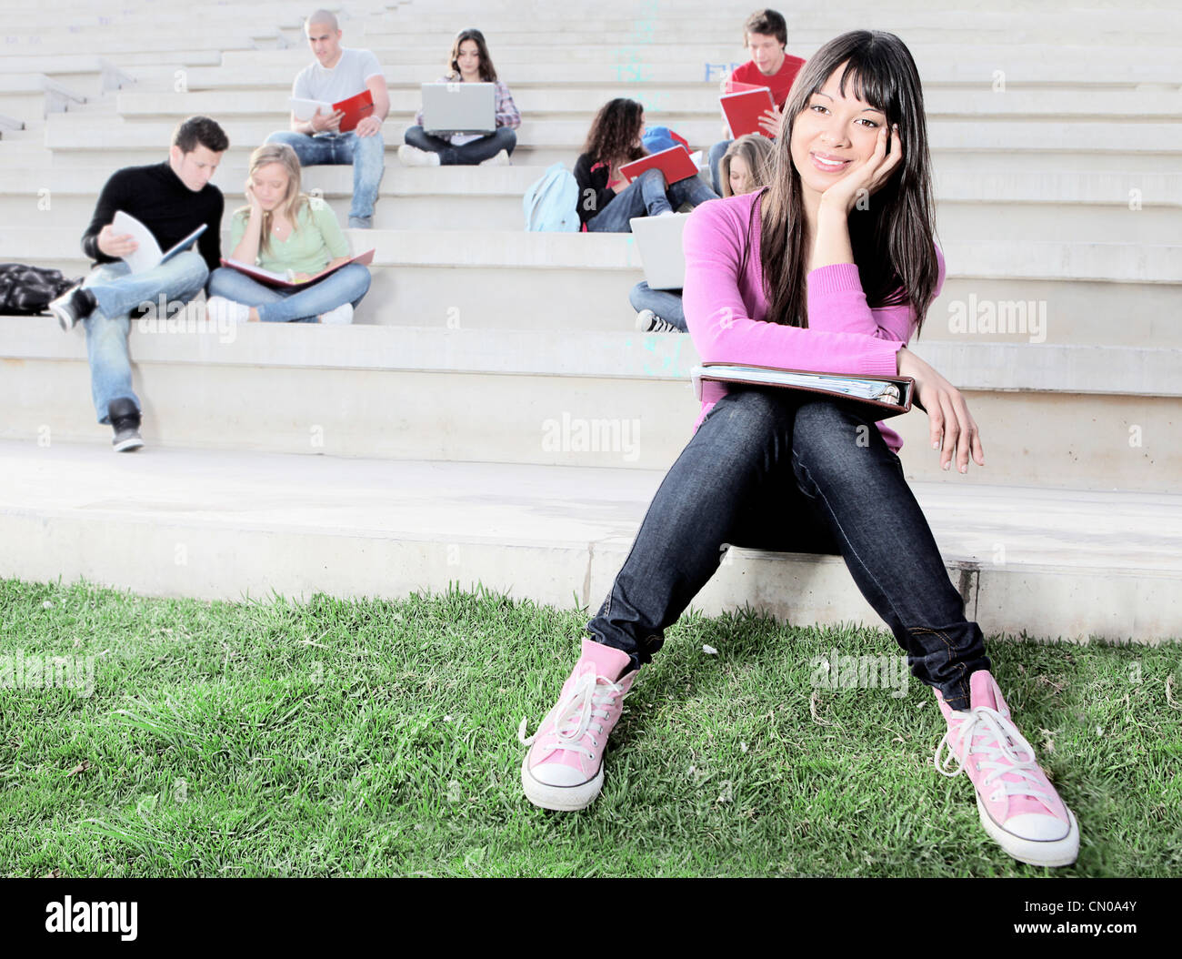students working outdoors on campus Stock Photo - Alamy