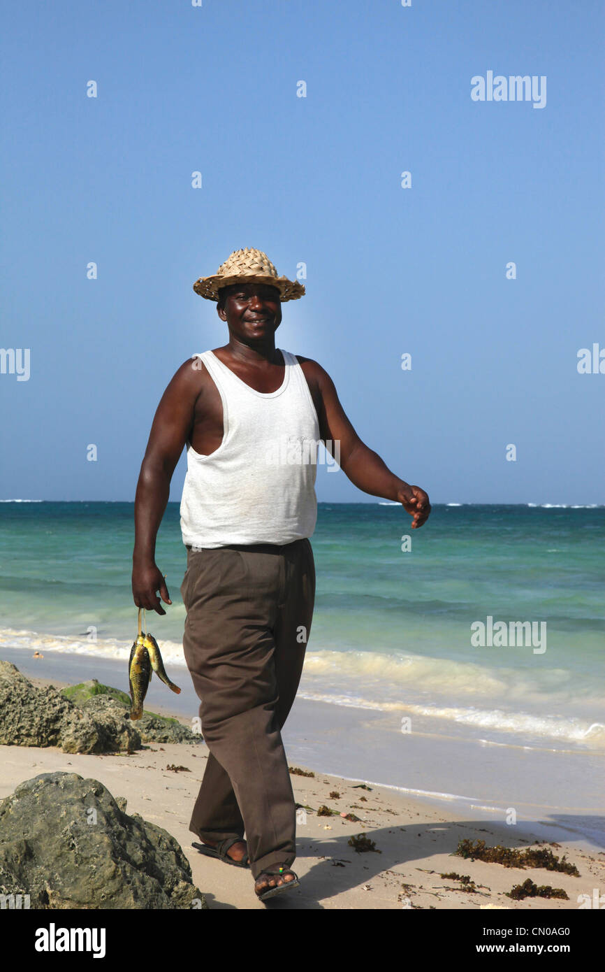 Man with fish on the beach Kenya Africa Stock Photo - Alamy