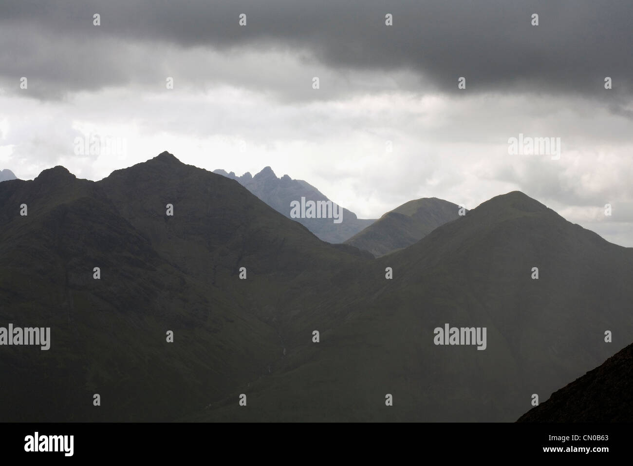 Brooding clouds passing over the Red Cuillin from Beinn Dearg Mhor ...