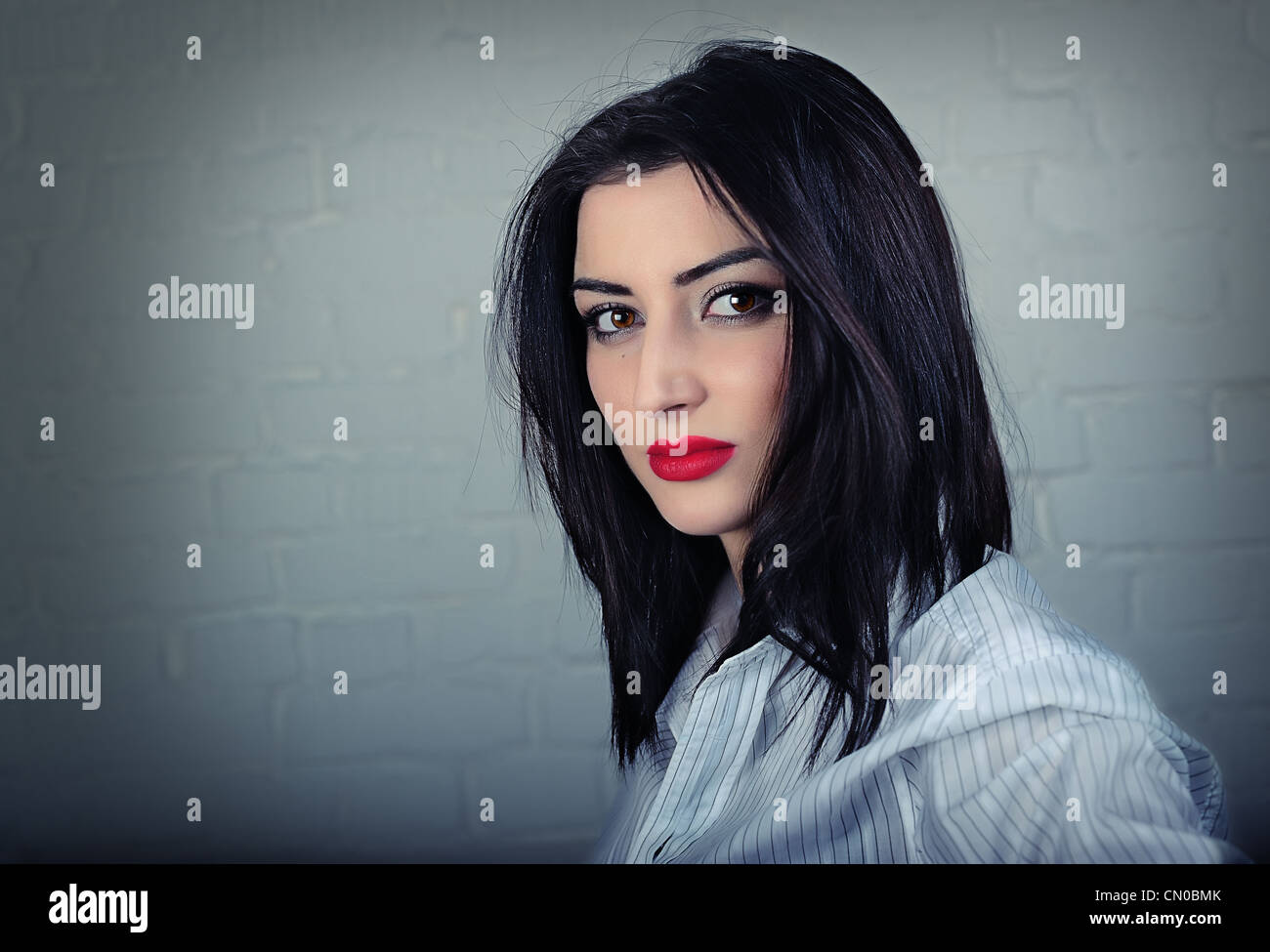 Stylish young woman dramatic portrait Stock Photo - Alamy