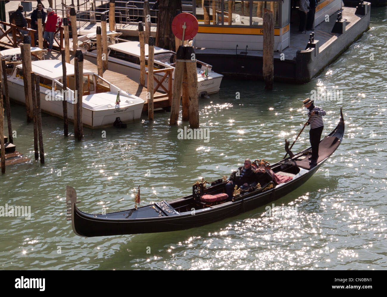Gondola moving along Grand canal Stock Photo - Alamy