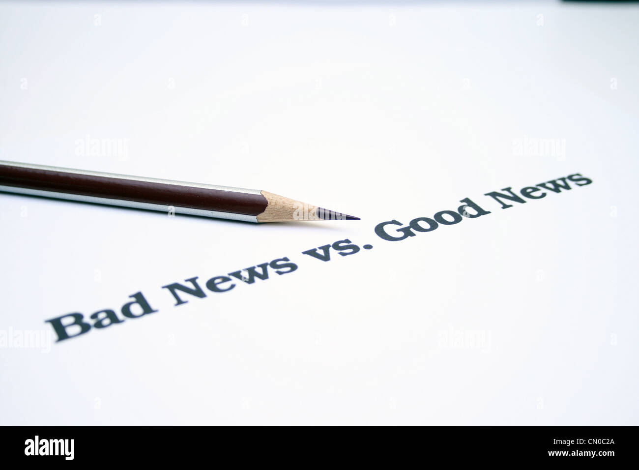 Bad news versus good news Stock Photo - Alamy