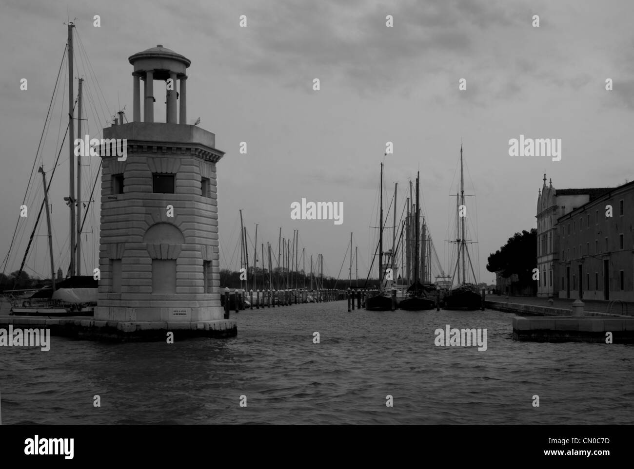 Yacht basin with lighthouse in black and white Stock Photo - Alamy