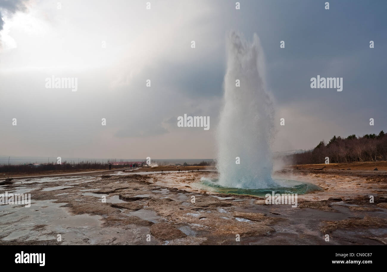 Strokkur, a fountain geyser in the geothermal area beside the Hvítá ...