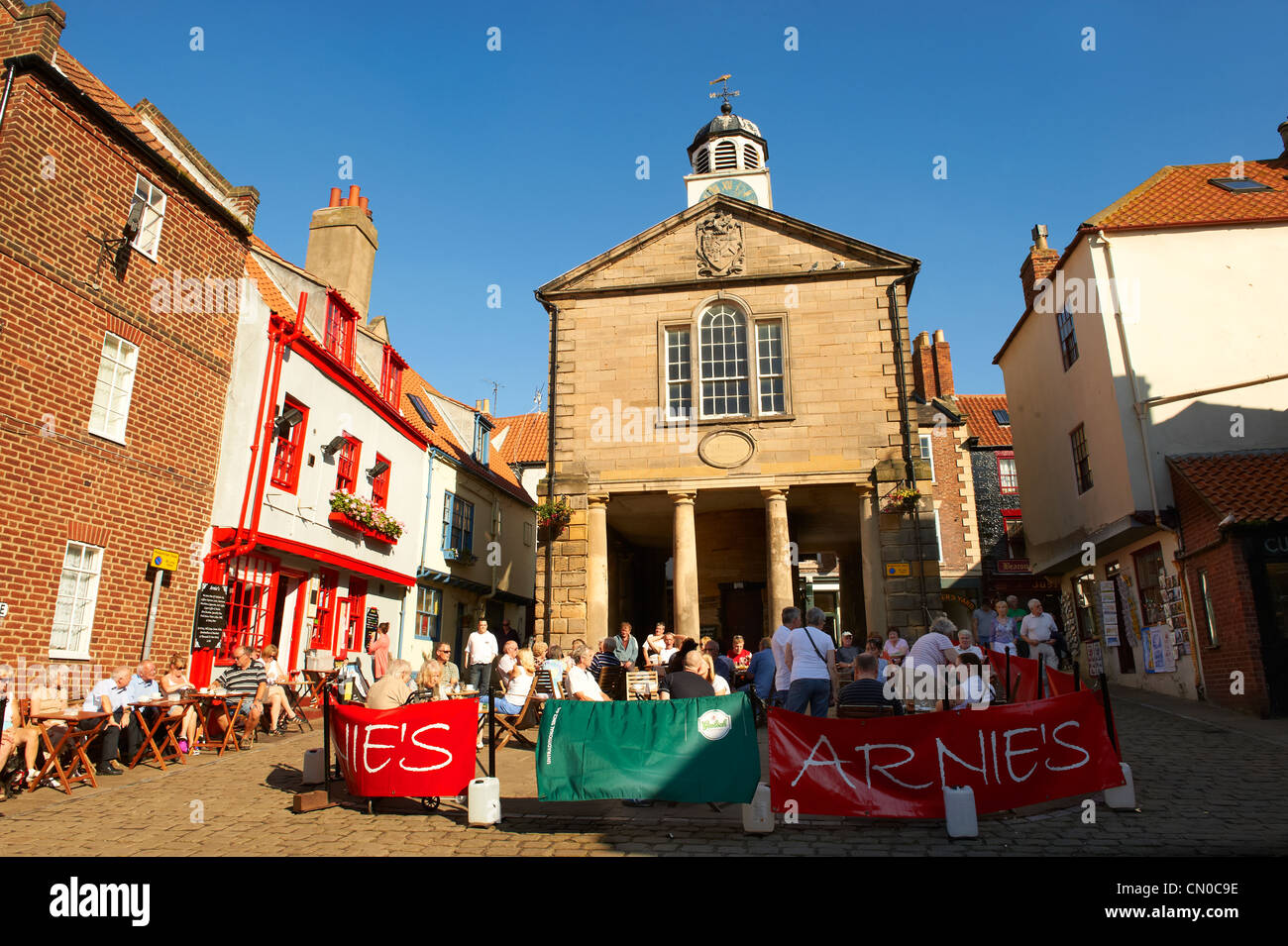 Cafe in the main square in front of the Old Town Hall in Whitby old ...