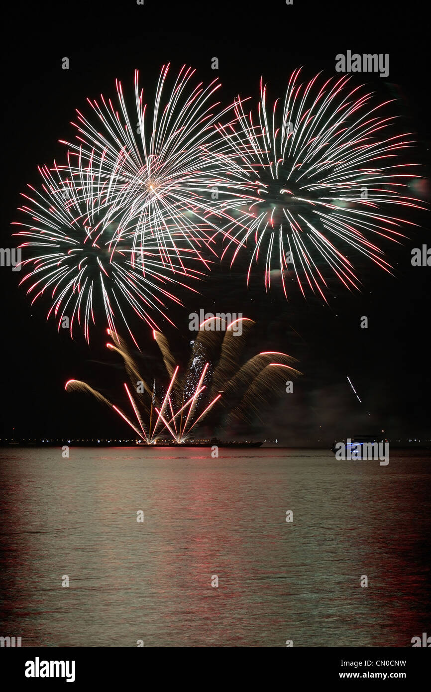 colorful huge fireworks display and reflection Stock Photo - Alamy