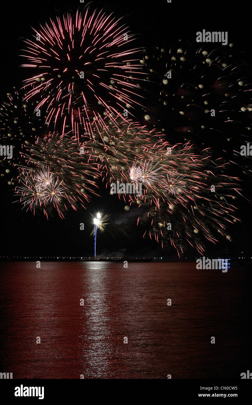 colorful huge fireworks display and reflection Stock Photo - Alamy