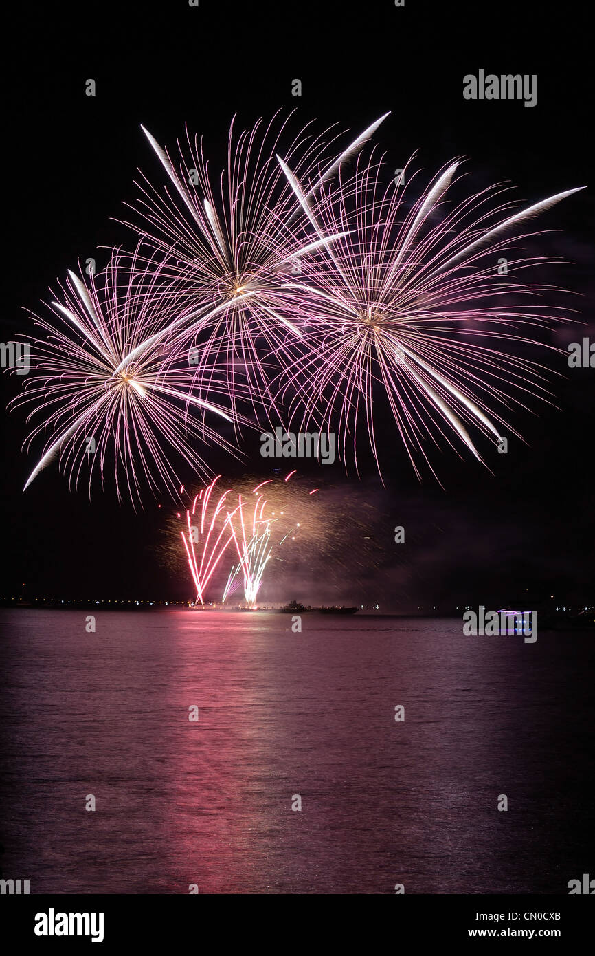 colorful huge fireworks display and reflection Stock Photo - Alamy