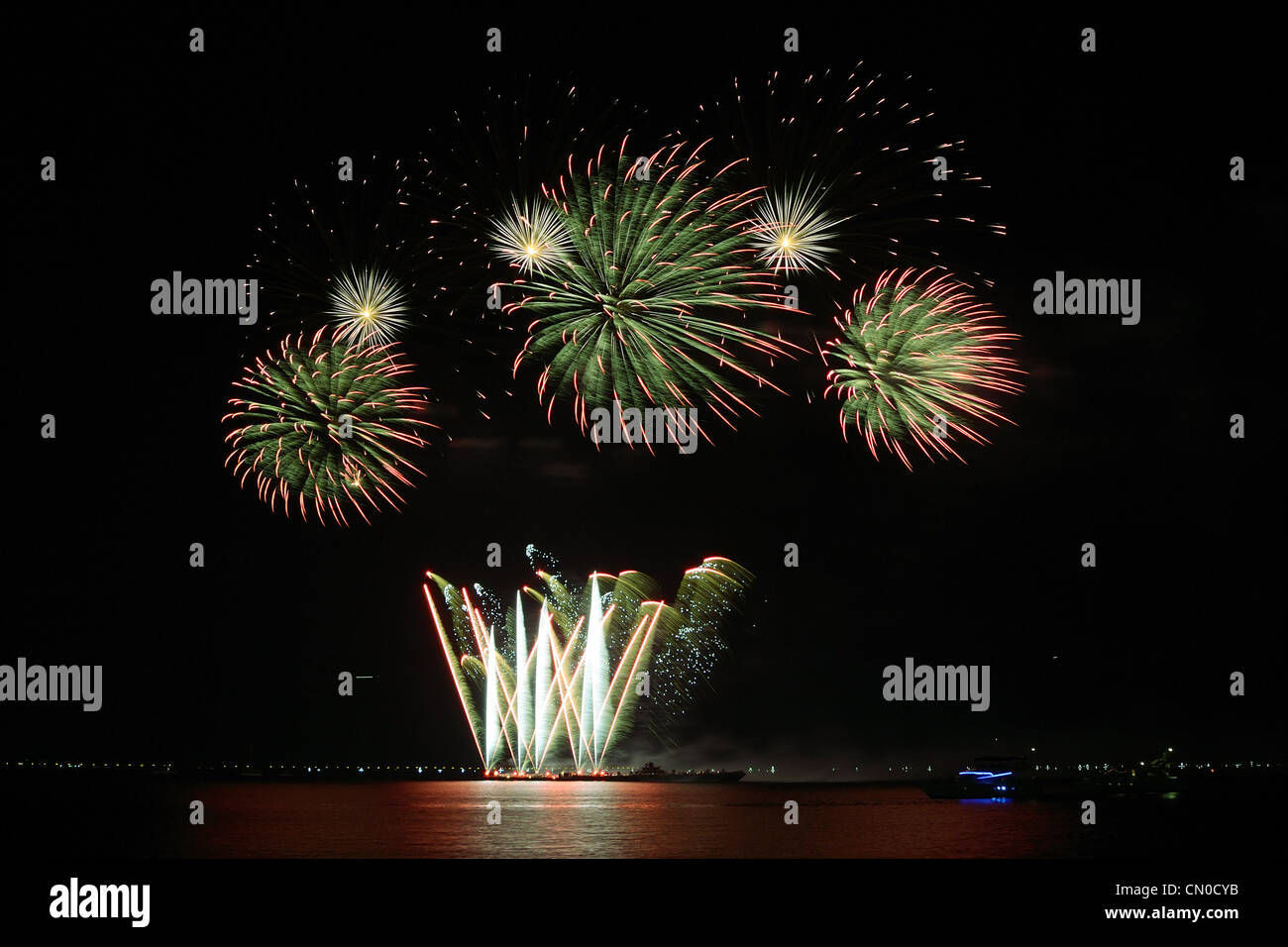 colorful huge fireworks display and reflection Stock Photo - Alamy