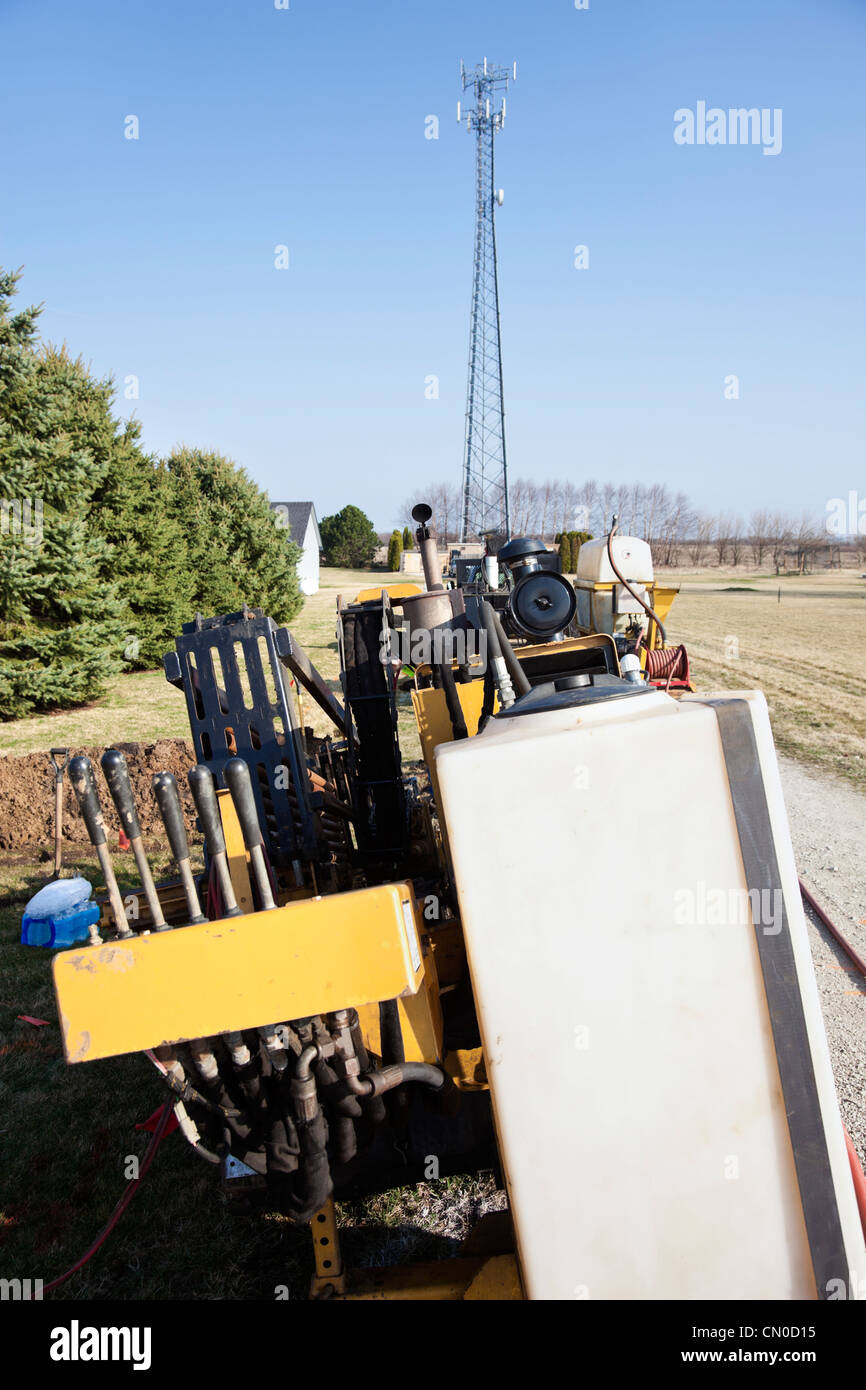 Directional boring and instaling the conduit for fiber. Cell tower in ...