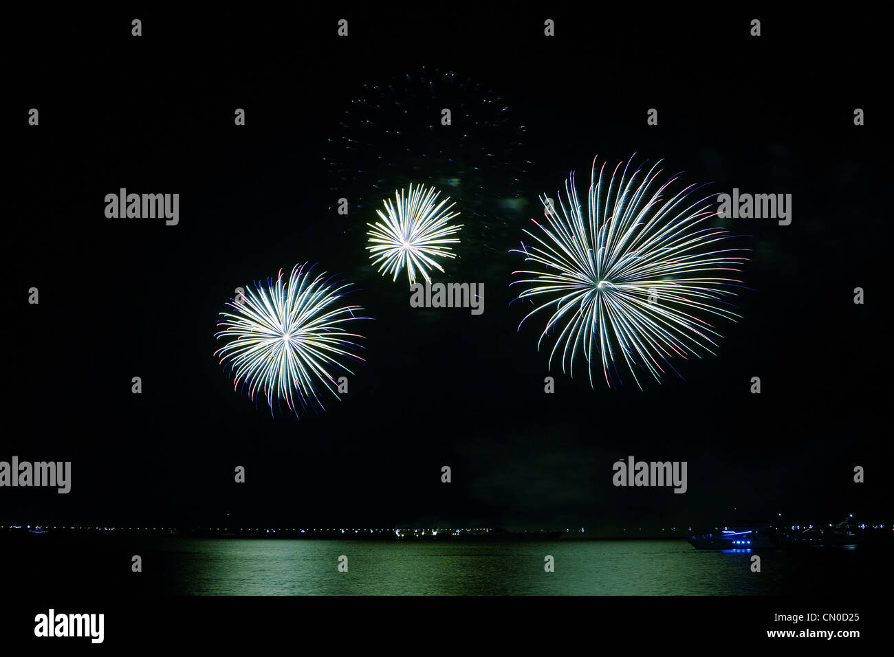 colorful huge fireworks display and reflection Stock Photo - Alamy