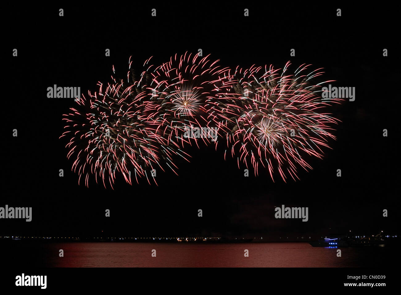 colorful huge fireworks display and reflection Stock Photo - Alamy