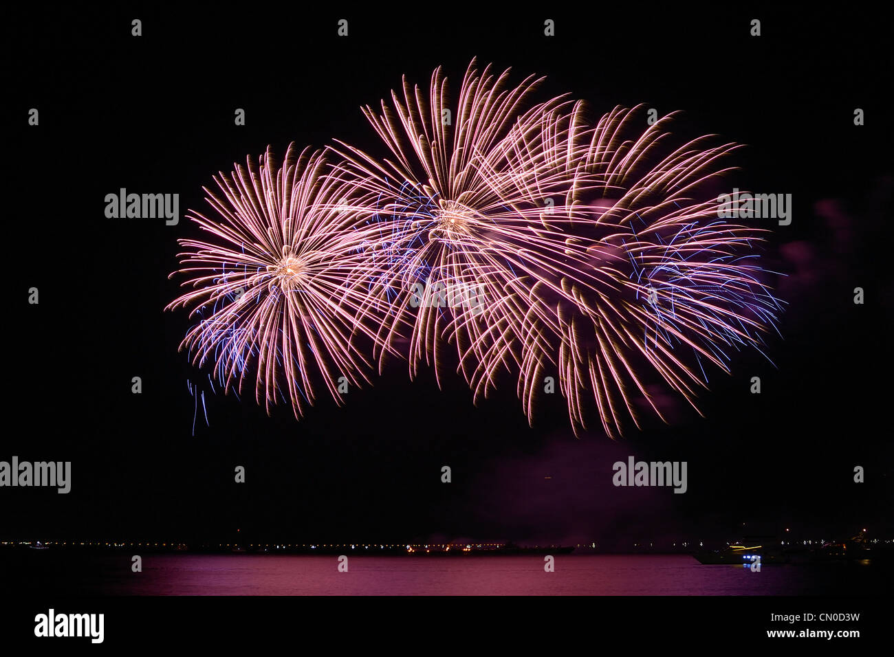 colorful huge fireworks display and reflection Stock Photo - Alamy