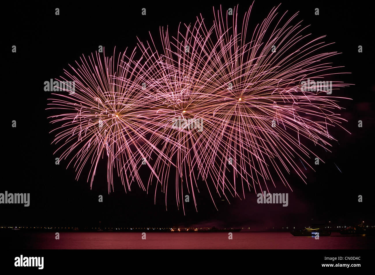 colorful huge fireworks display and reflection Stock Photo - Alamy