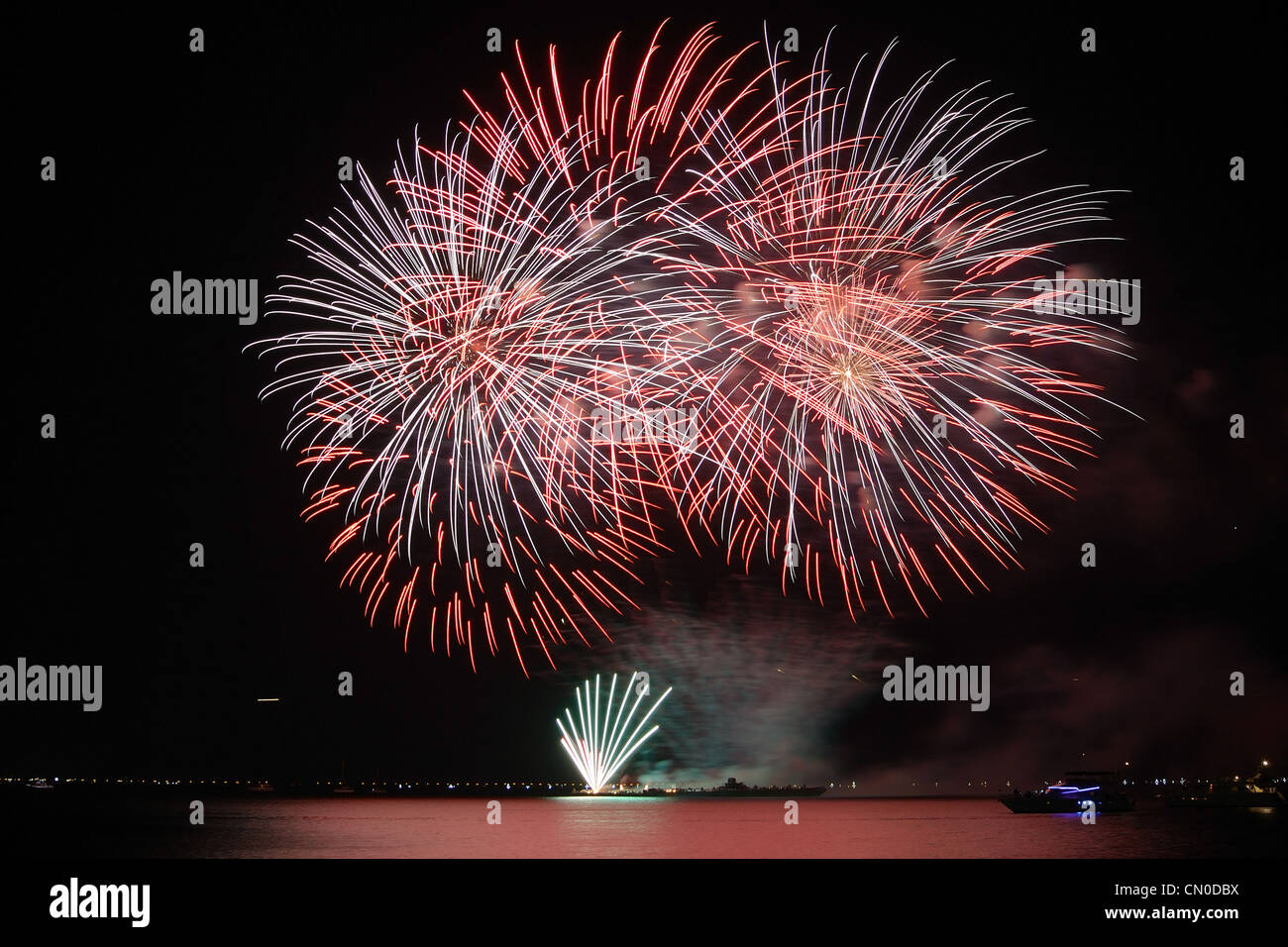 colorful huge fireworks display and reflection Stock Photo - Alamy