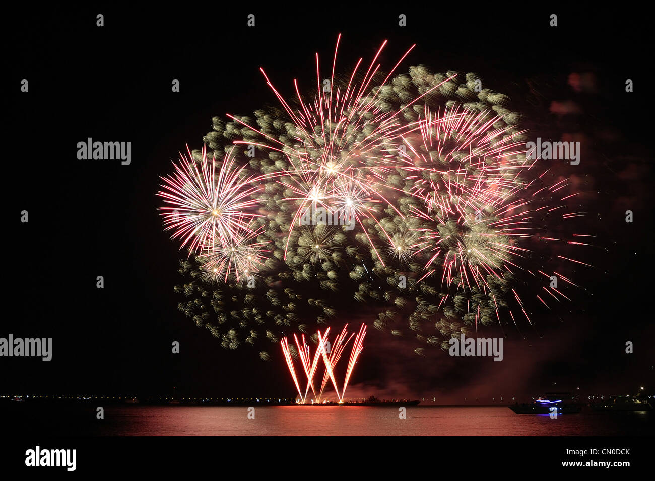 colorful huge fireworks display and reflection Stock Photo - Alamy