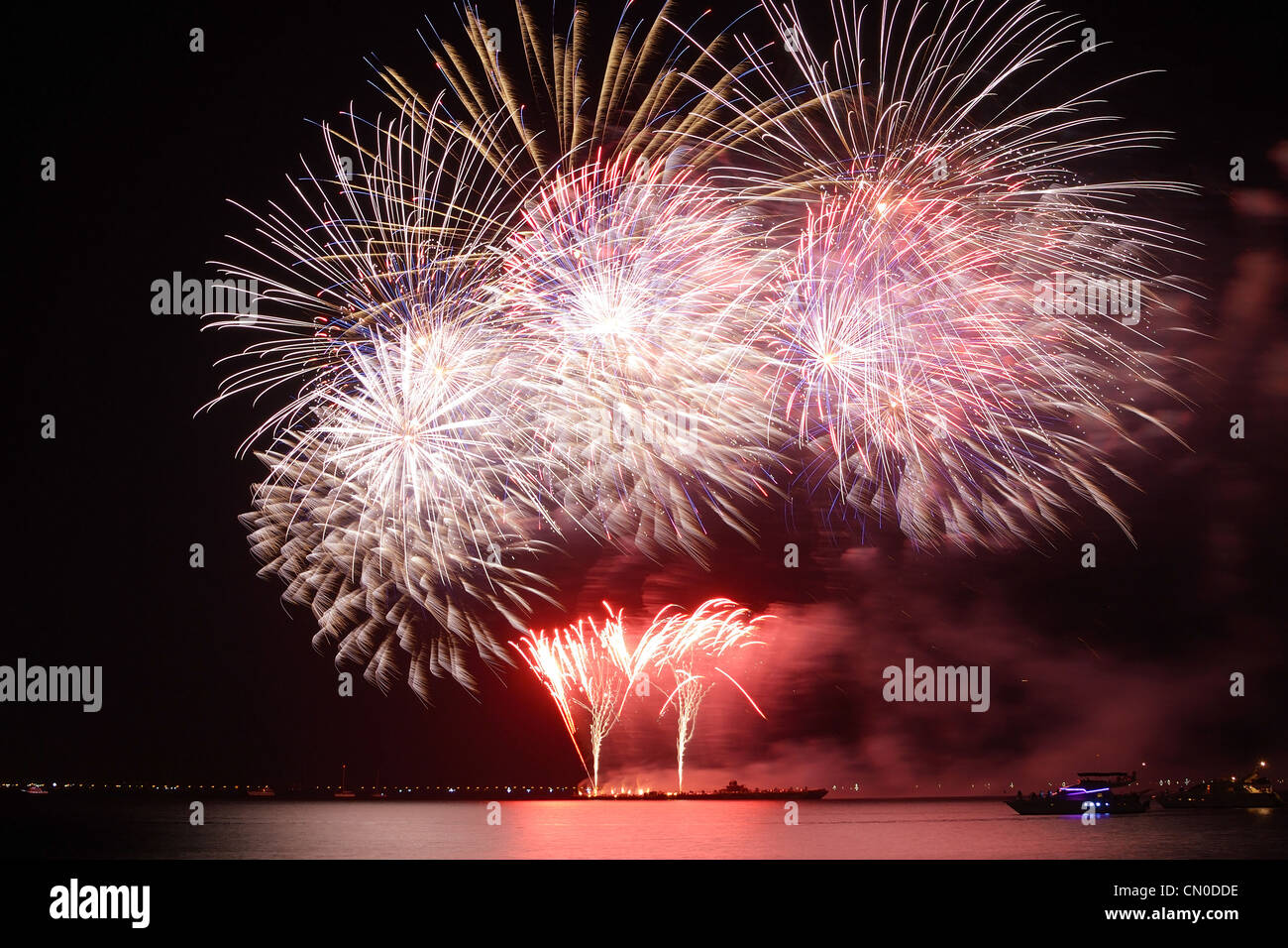 colorful huge fireworks display and reflection Stock Photo - Alamy