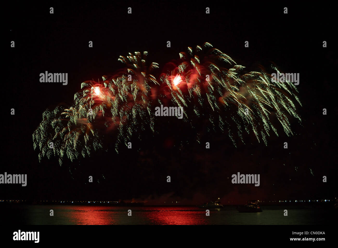 colorful huge fireworks display and reflection Stock Photo - Alamy