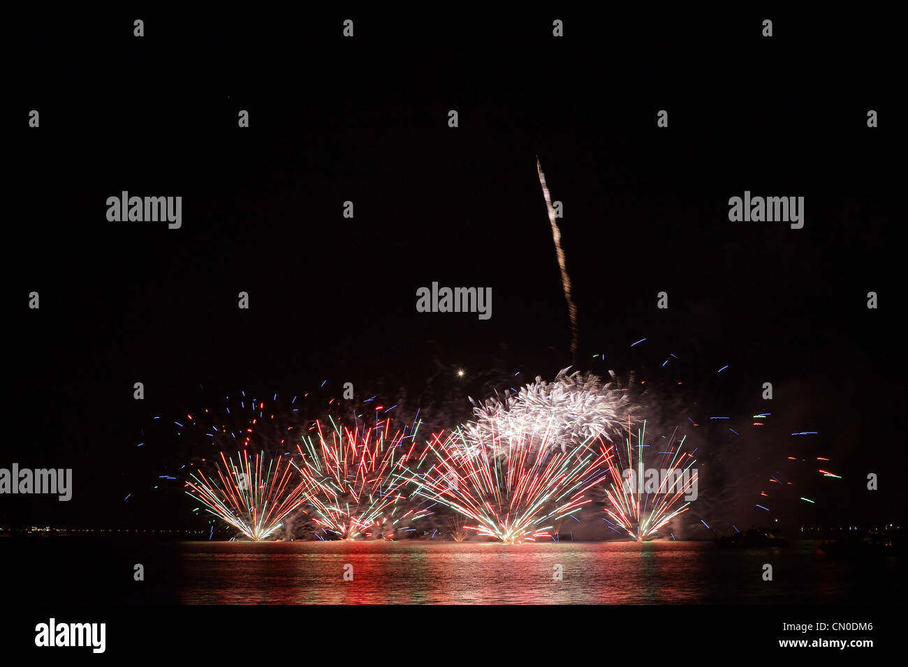 colorful huge fireworks display and reflection Stock Photo - Alamy