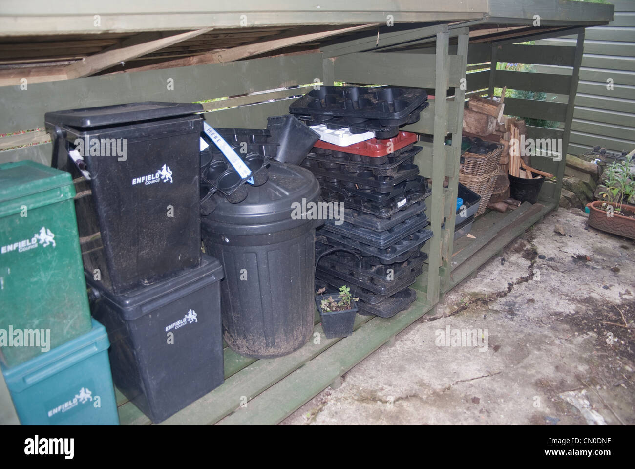 purpose built garden bin and storage area Stock Photo - Alamy
