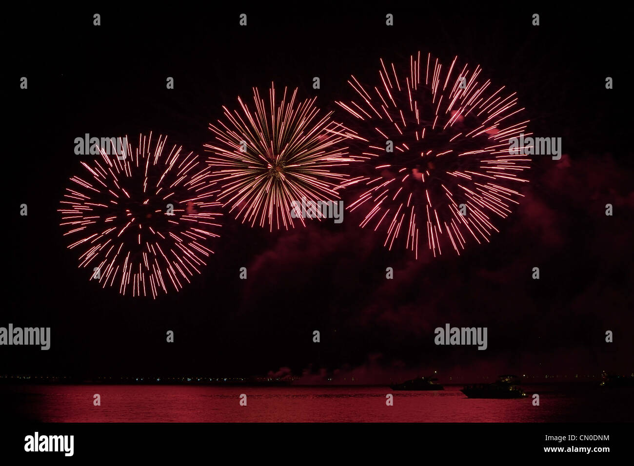 colorful huge fireworks display and reflection Stock Photo - Alamy