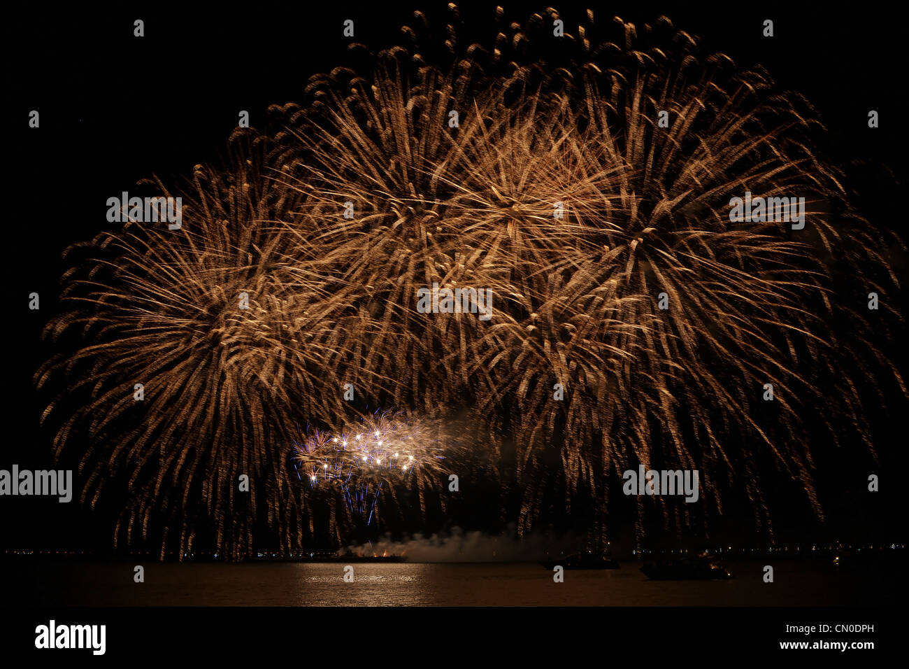 colorful huge fireworks display and reflection Stock Photo - Alamy