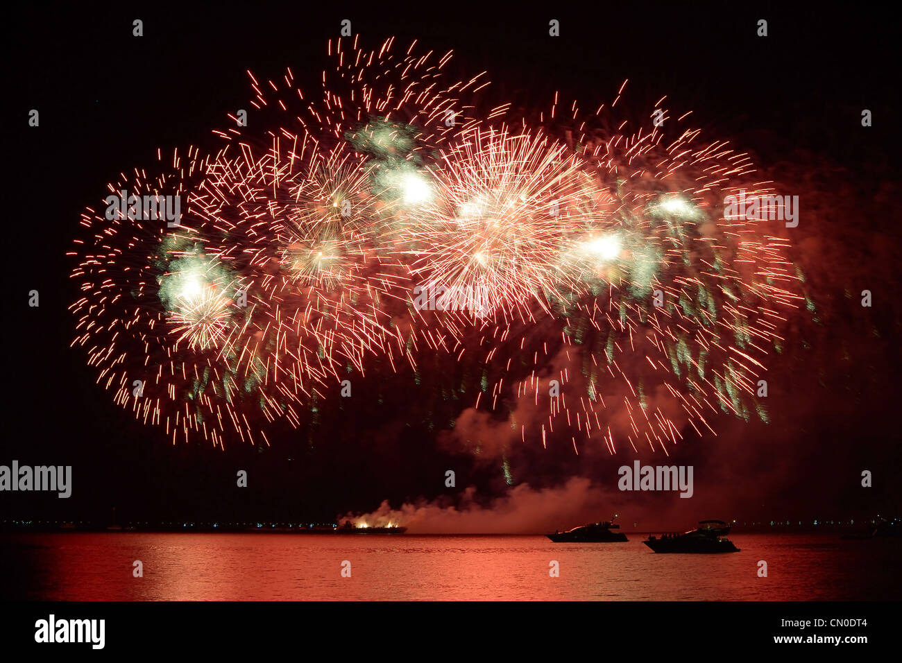 colorful huge fireworks display and reflection Stock Photo - Alamy