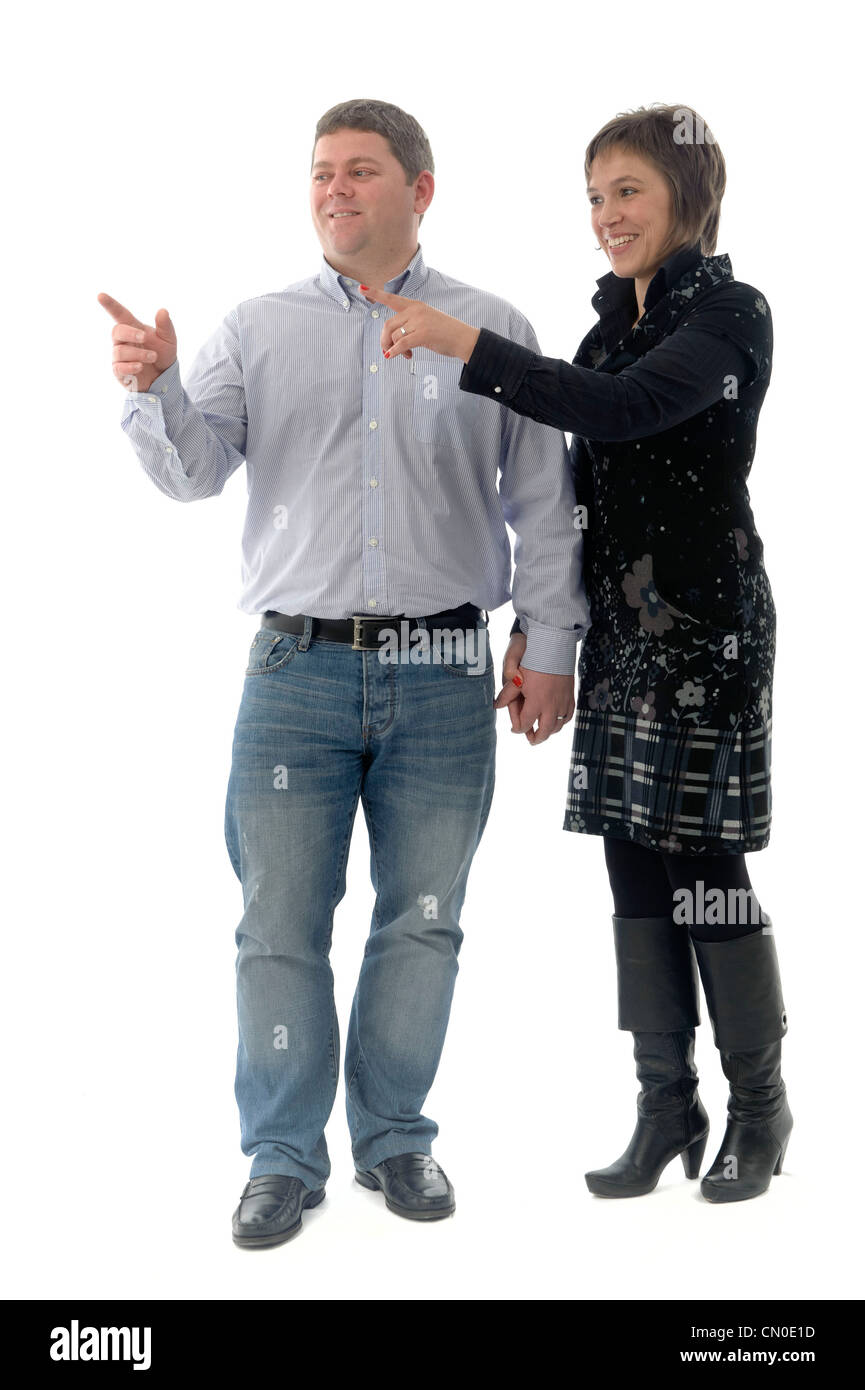 Couple pointing full length isolated on white background Stock Photo ...