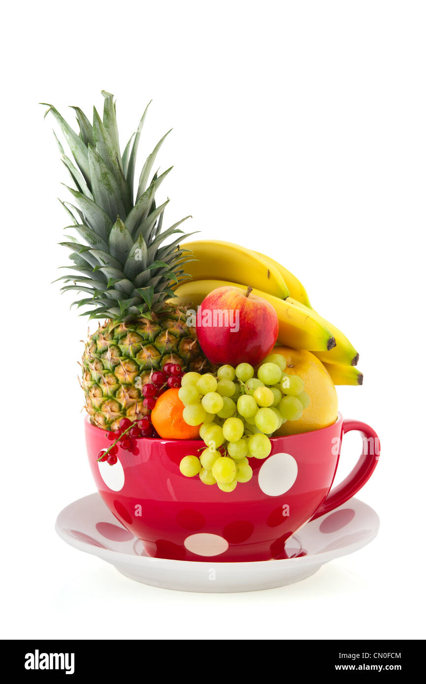 Fruit assortment in big red cup Stock Photo - Alamy