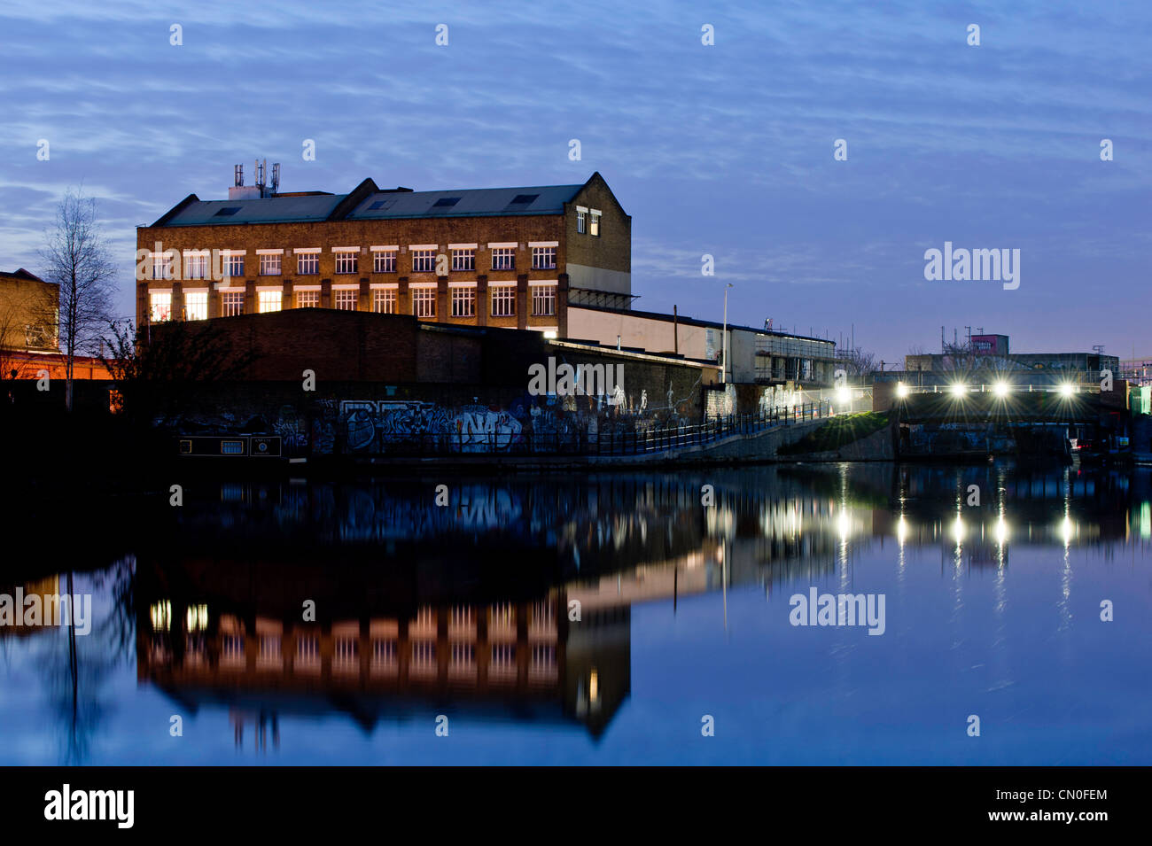 Hackney Wick seen across Lee Navigation at night, London. United ...